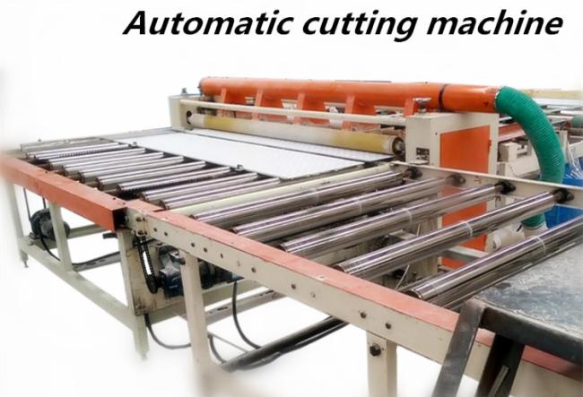 PVC Gypsum Ceiling Tile Make Machine in operation