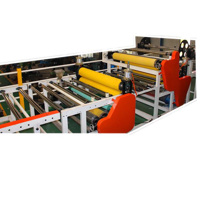 Automatic PVC Gypsum Ceiling Tile Make Machine in operation
