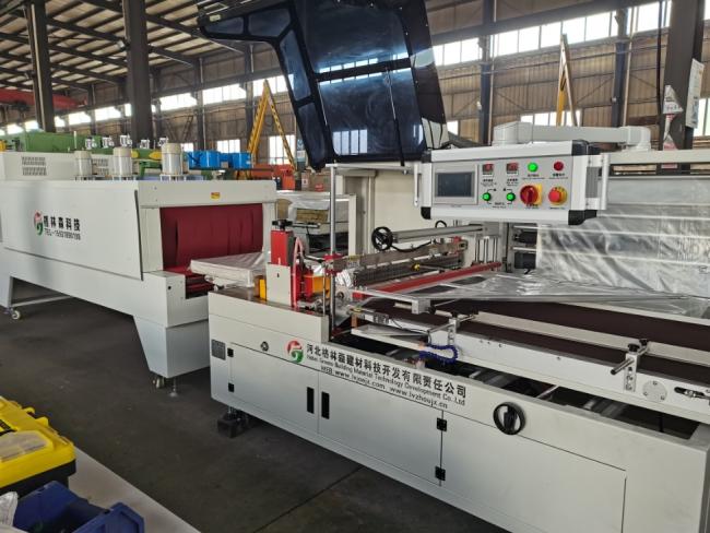 PVC Plaster Ceiling Tiles Board Production Line in operation