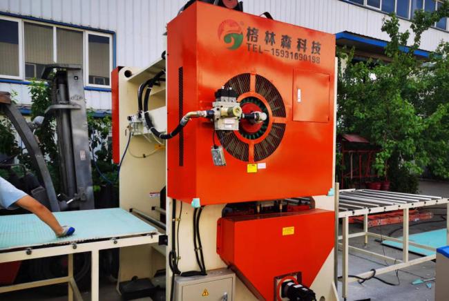 Gypsum Ceiling Tiles Perforation Machine in operation