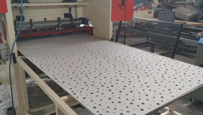 LVJOE Brand Gypsum Board Perforation Machine in operation