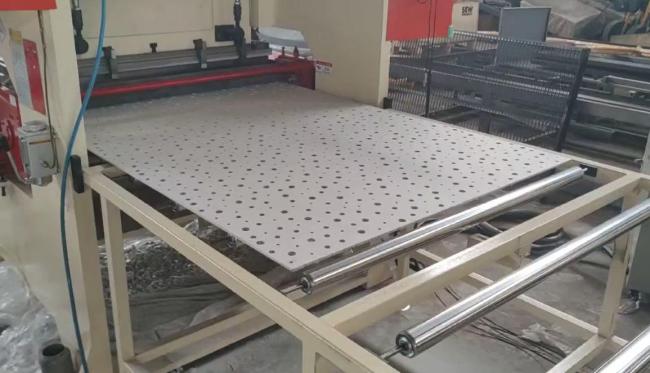 Full Automatic Board Perforating Punching Machine in operation