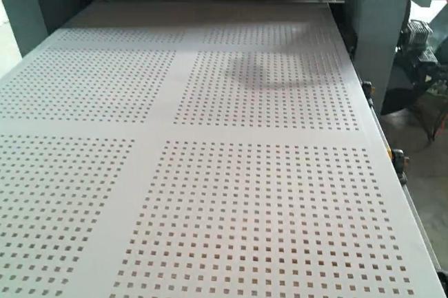 LVJOE Gypsum Board Perforation Machine in operation