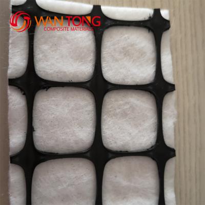 中国 400g 土壌安定化用非織布ビアキシアルプラスチックジオグリッド複合物 黒いジオグリッド 販売のため