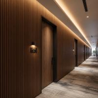 China Interior WPC Decorative Wall Panel Fire Rated Hotel Corridor Wall Cladding Board for sale
