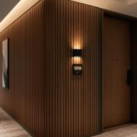 China Interior WPC Decorative Wall Panel Fire Rated Hotel Corridor Wall Cladding Board for sale