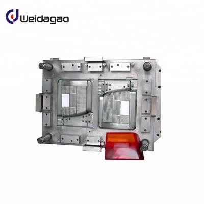 China 2 Cavity Injection Molding Automotive Parts Cold Runner Car Light Bicycle Back for sale