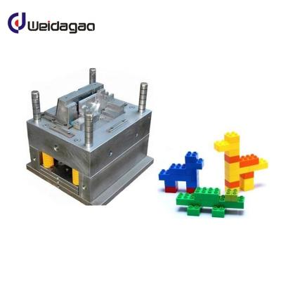 Cina Lavorazione con utensili di plastica dello stampaggio ad iniezione di LKM/stampaggio ad iniezione di plastica che fa il blocchetto del giocattolo per divertimento in vendita