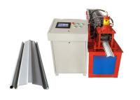 China Embossing Type Roller Shutter Door Roll Forming Machine Material Thickness 0.8-1.2mm for sale