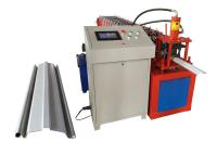 China Embossing Type Roller Shutter Door Roll Forming Machine Material Thickness 0.8-1.2mm for sale