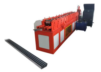 China Steel Side Guide Rail Roller Shutter Door Roll Forming Machine Size 5.6*1.2*1.5m for sale