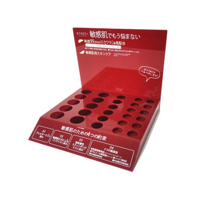 China Oil Lamination Plastic Pop Display Stand UV Printing Cosmetic Makeup Display Stand for sale