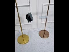 t shape metal retail display round base adjustable height ss display rack for clothing