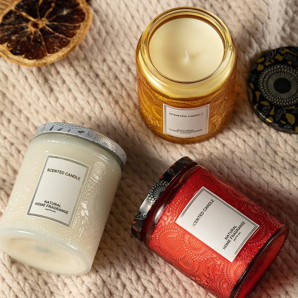 Quality Yellow / Red / White Soy Scented Candle Embossed Glass Jar Candles For Private Label OEM for sale