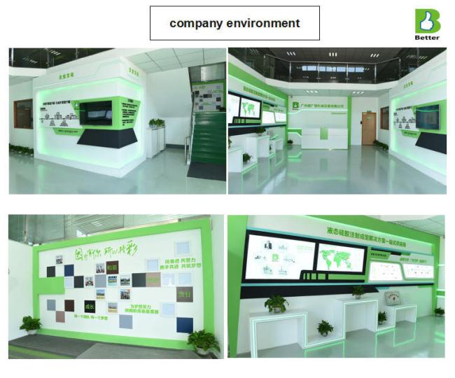 Vertical LSR Injection Molding Machine showing control panel and injection unit