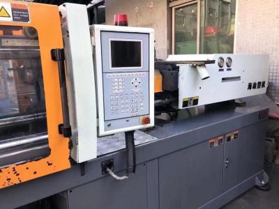 China Maschine Haixiong 128 Ton Used Plastic Injection Moulding klein mit Sevor-Motor zu verkaufen