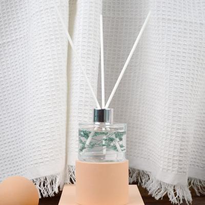 Cina Bottiglie di diffusore di canna di lusso 100 ml Bottiglia di vetro a forma rotonda per profumi domestici in vendita