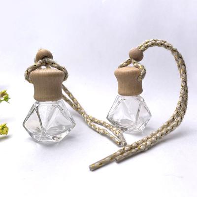 China 7ml Empty Car Air Freshener Hanging Glass Bottle For Essential Oils for sale
