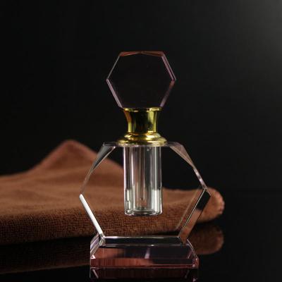 China 6ml Pink Crystal Perfume Bottle with Engraved Design for sale