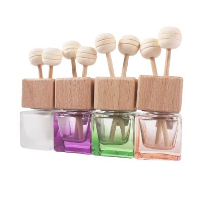 China 8ml Rattan Wood Ball Car Perfume Bottle with Wooden Lid for sale