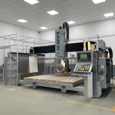 China 5-Axis Bridge Stone Cutter with Italian DDX System, 900mm Saw Blade, and ±0.1 mm Cutting Accuracy for sale