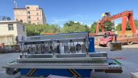 China Fully automatic CNC horizontal multifunctional edging machine for precision edge finishing for sale