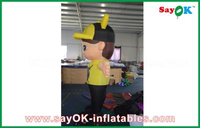 China Inflated Cartoon Characters Oxford Cloth Inflatable Cartoon Characters Yellow Boy Children For Advertising for sale