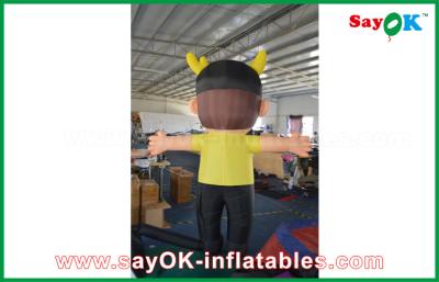 China Inflated Cartoon Characters Oxford Cloth Inflatable Cartoon Characters Yellow Boy Children For Advertising for sale