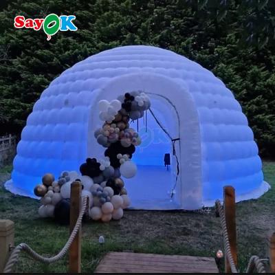 China Tejido de Oxford resistente al agua Luces LED coloridas Cúpula exterior Tienda de iglú inflable con soplador en venta