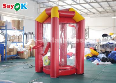 China Cabina inflable del dinero de los productos/PVC del cubo inflable de encargo rojo de la lona con 2 ventiladores en venta