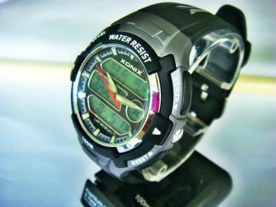 Cina Gli orologi analogico digitali sportivi rotondi dei signori con la luce di EL contano alla rovescia il temporizzatore in vendita