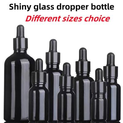 Cina 5 ml 10 ml 15 ml 20 ml 30 ml 50 ml 100 ml Bottiglia nera di olio essenziale Bottiglia di vetro per gocce in vendita