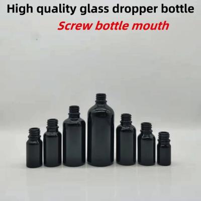 Cina 5 ml 10 ml 15 ml 20 ml 30 ml 50 ml 100 ml Bottiglia nera di olio essenziale Bottiglia di vetro per gocce in vendita