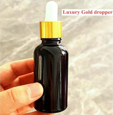 Cina Nero 10, Ml 15ml 20ml 30ml 50ml vuoto rotondo nero lucido Vetro Bottiglia gocciolante per olio essenziale con anello in oro di plastica in vendita