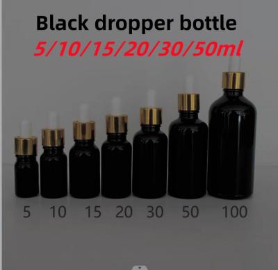 Cina 5ml 10ml 15ml 20ml Siero di olio essenziale Spalla piatta Rotonda Bottiglia di olio essenziale lucida Bottiglia di vetro nero in vendita
