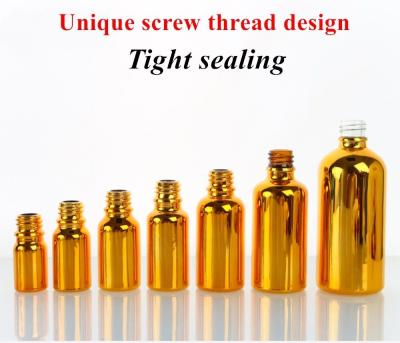 Cina Luxury Brillante 30ml 50ml 60ml Oro Electroplate UV Siero vetro dorato olio essenziale bottiglia gocciolante di vetro con testa spray in vendita
