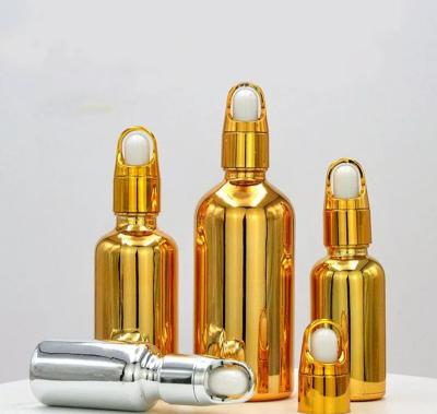 Cina Cosmetici di lusso di alta qualità Pacchetto 10ml 20ml 30ml 50ml Electroplating Gold Essential Oils Serum Glass Dropper bottle in vendita