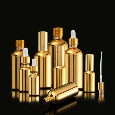 Cina 30 ml 50 ml Electropplating Gold Silver Glass Spray Cosmetici Bottiglia Cosmetici Oro Bottiglia di olio essenziale in vendita