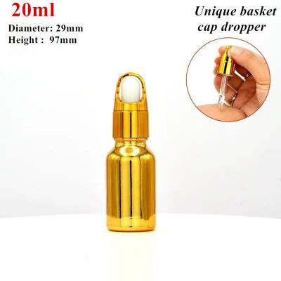 Cina 10ml 20ml 30ml 50ml Elettroplate Colore Oro Imballaggio Cosmetico di lusso Bottiglie gocciolanti in vetro per uso di oli essenziali in vendita