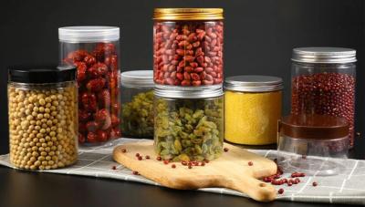 Cina 250ml 500ml PET Plastic Jar For Food Packing , Clear Plastic Cookie Candy Honey Food Jar With Aluminum Lid in vendita