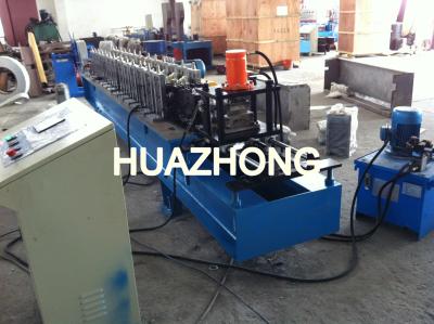 Cina rotolo materiale d'acciaio delle stecche dello sportello di 90mm che forma i prezzi a macchina con velocità 8-12m/min in vendita