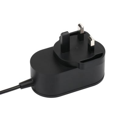 Cina Adattatore di potere di 600mA certificato le BS 12W 20V, adattatore della parete di 2 forconi per la batteria al litio in vendita