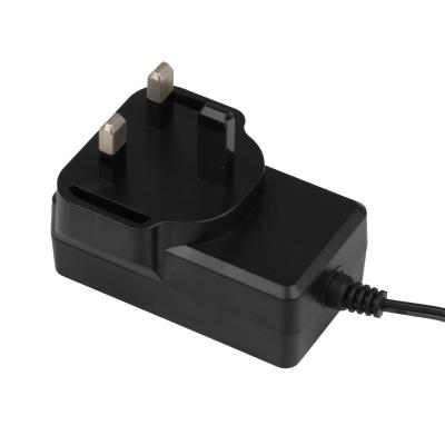 China Ac Dc Adapter 24v Output IEC61558 Certified With British Plug For Air Purifier for sale