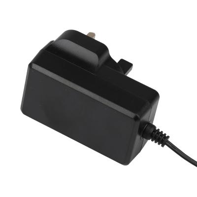 China Ac Dc Adapter 24v Output IEC61558 Certified With British Plug For Air Purifier for sale