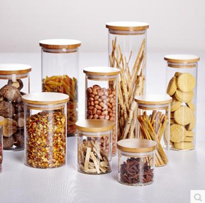 China High borosilicate glass sealed jar straight cylinder bamboo lid sealed jar round transparent food storage tank for sale