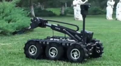 中国 精密140kgローディングの能力黒色の機械化の不発弾処理のロボット 販売のため