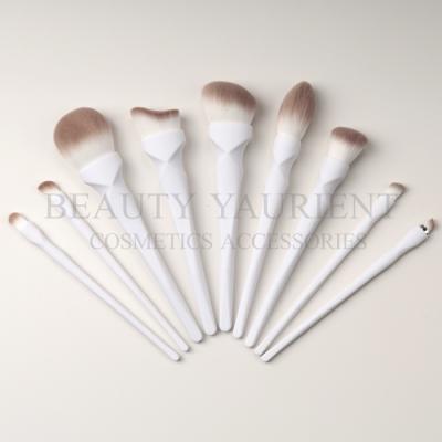 Cina 9pcs che tutti in un set di pennelli bianco di trucco del fronte hanno brevettato il cosmetico di stile di X spazzolano i corredi di trucco in vendita