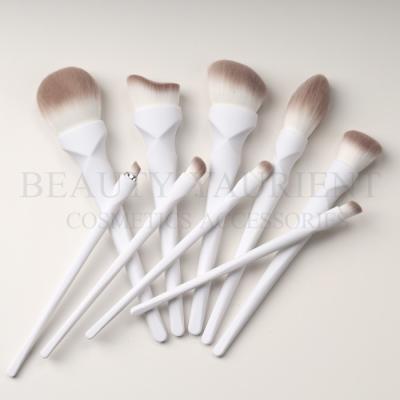 Cina 9pcs che tutti in un set di pennelli bianco di trucco del fronte hanno brevettato il cosmetico di stile di X spazzolano i corredi di trucco in vendita
