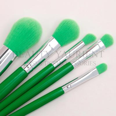 Cina spazzole di trucco della maniglia di verde dei capelli dell'insieme PBT della spazzola e della borsa di trucco 5pcs in vendita