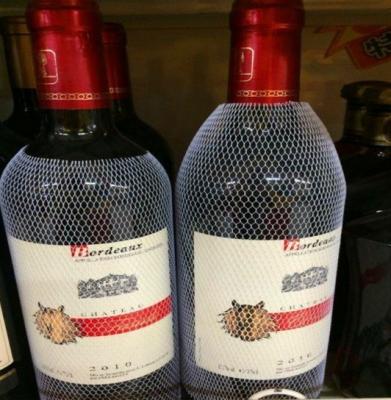 China Wine Bottle Mesh Packaging Sleeves , Protective Mesh Liquor Bottle Sleeves for sale